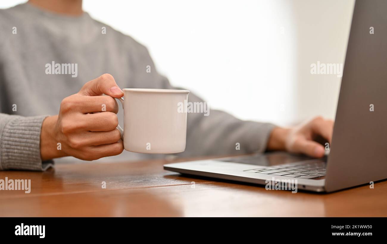 A businessman or male college student working on his project ...