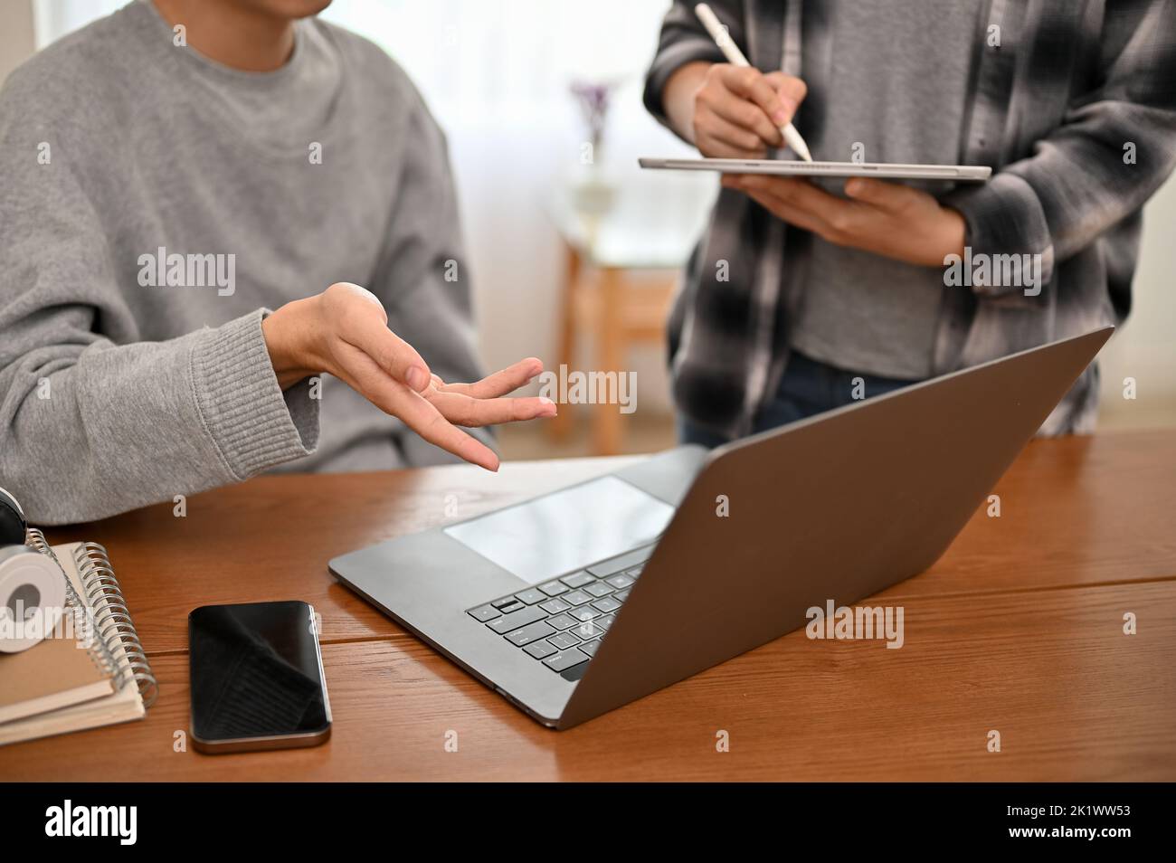 A professional Asian businessman or male boss showing something on ...