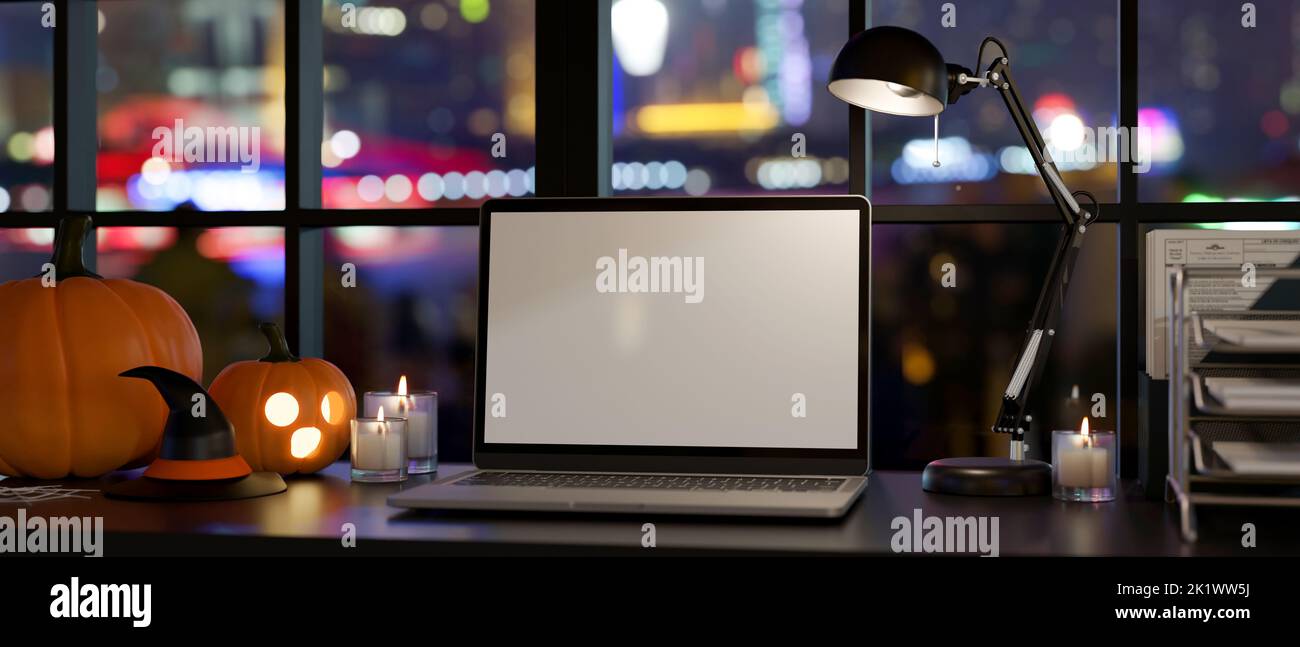 Modern office desk workspace in Halloween night decorated with laptop ...