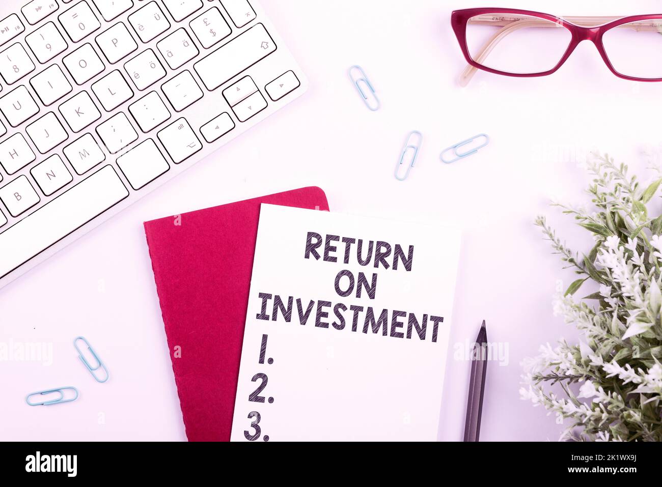 Hand writing sign Return On Investment. Business approach Ratio between ...