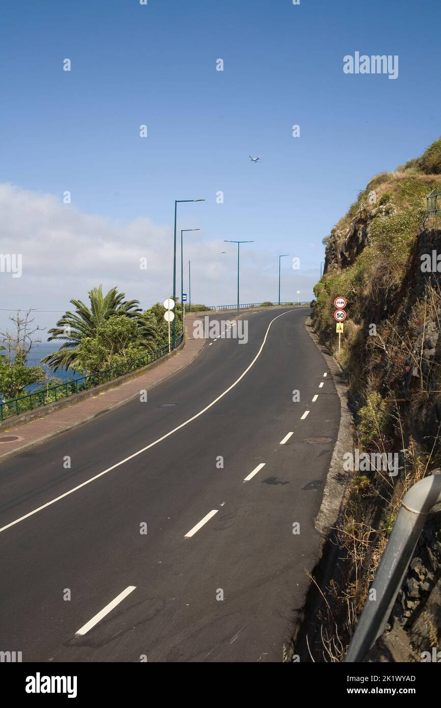 Road leading uphill to bend in Machico in Eastern Madeira Stock Photo ...