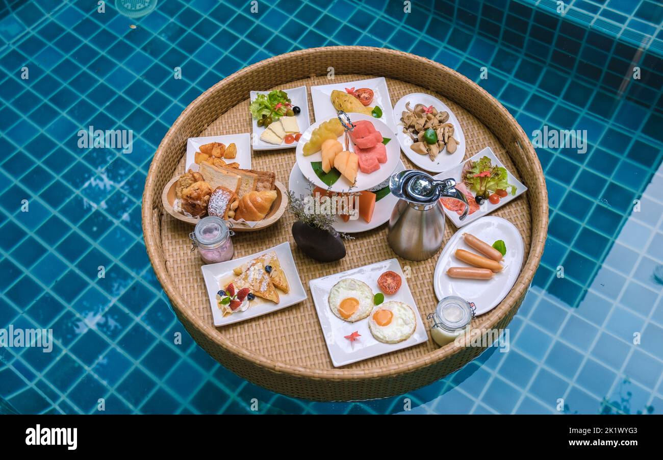 Top view of floating breakfast in the swimming pool, floating breakfast ...