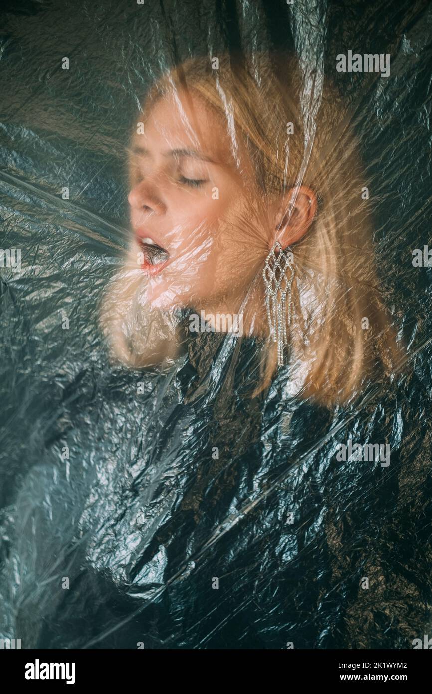 Female abuse. Defocused art portrait. Domestic violence. Disturbed hurt ...