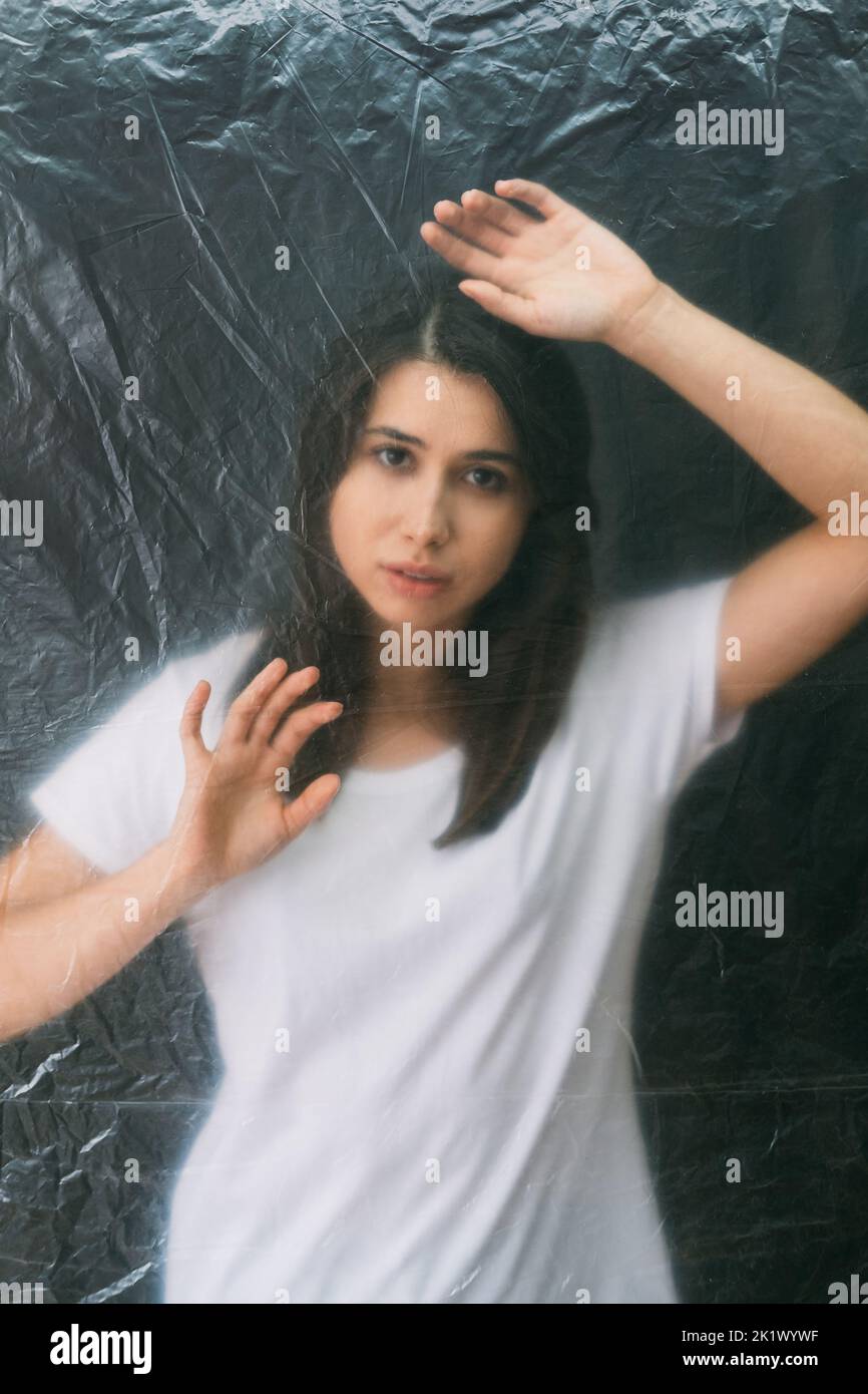 Female loneliness. Defocused portrait. Misery tragedy. Regret sorrow ... Female loneliness. Defocused portrait. Misery tragedy. Regret sorrow ...