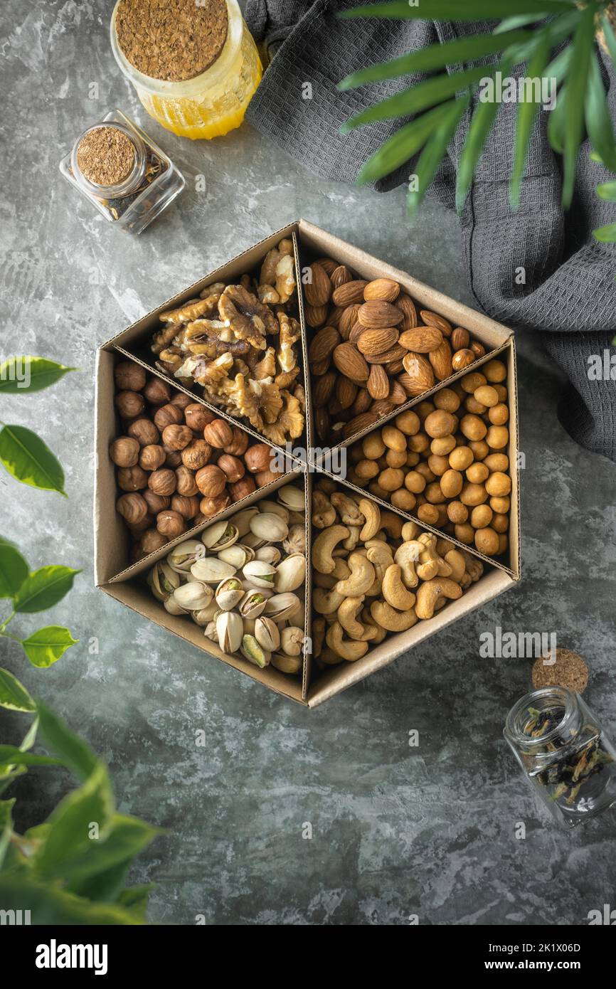 a set of nuts. a healthy snack. peanuts, pistachios, walnuts, macadamia ...