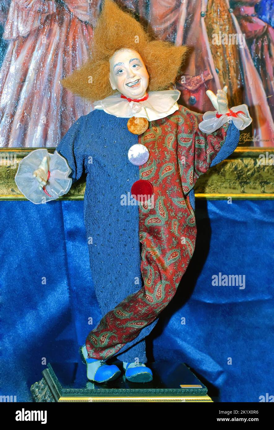 A collectible doll, a red clown, is on display at the Fashion Doll ...