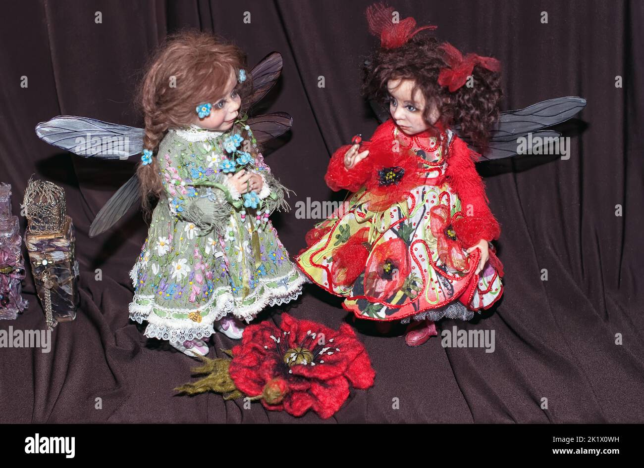 Collectible dolls, two fairies, are on display at the Fashion Doll ...