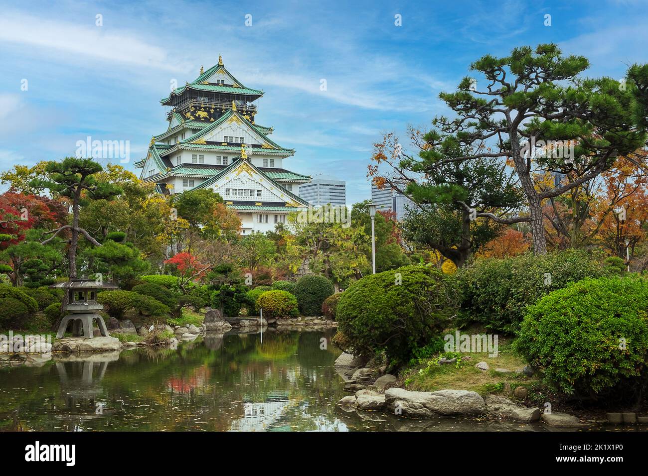 Osaka castle in Autumn foliage season, is a famous Japanese castle ...