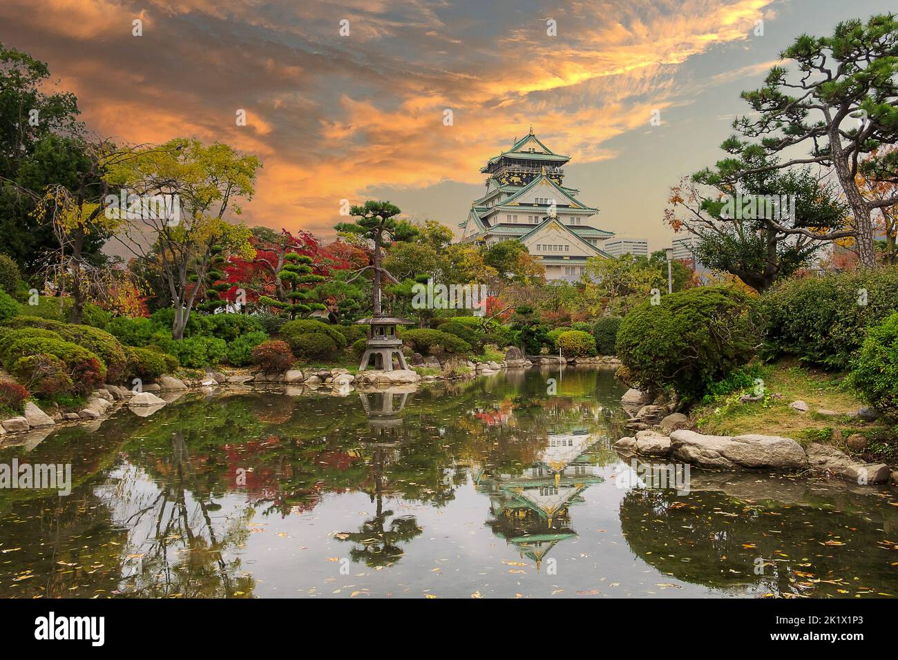 Osaka castle in Autumn foliage season, is a famous Japanese castle ...