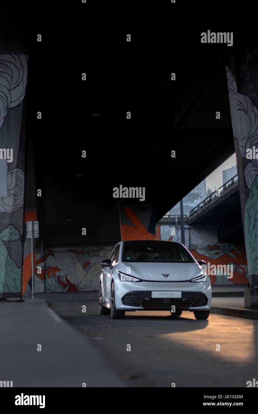 A white luxury car on the road Stock Photo - Alamy