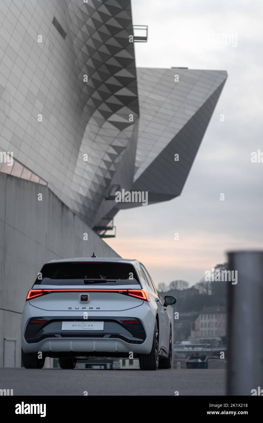 A white luxury car on the road Stock Photo - Alamy