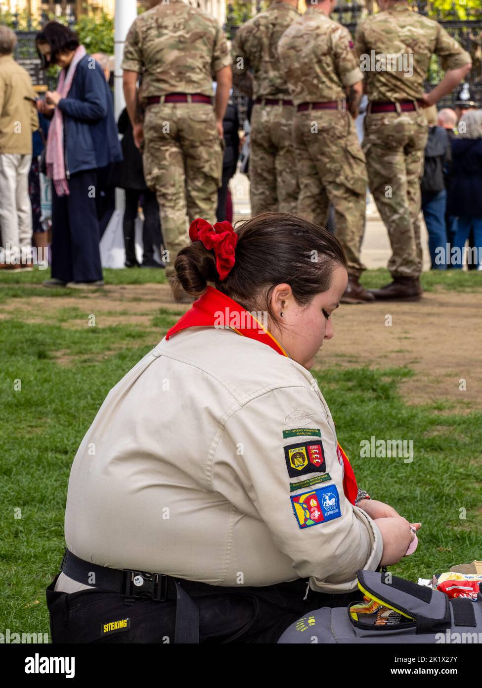 LONDON, ENGLAND - SEPTEMBER 16: A Scout sits in Parliament Square to ...