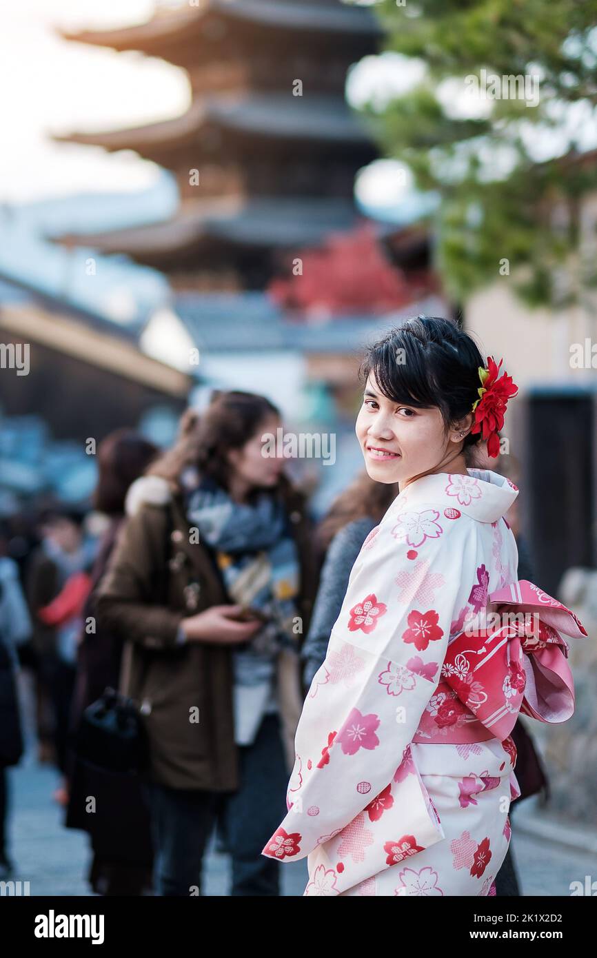 young woman tourist wearing kimono enjoy in Yasaka pagoda area near ...