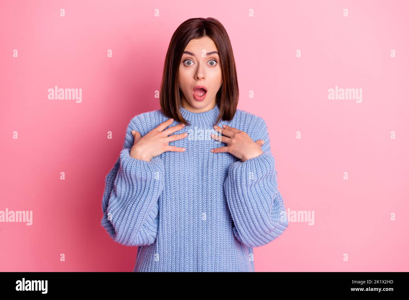 Portrait of shocked young girl hands touch chest open mouth staring ...