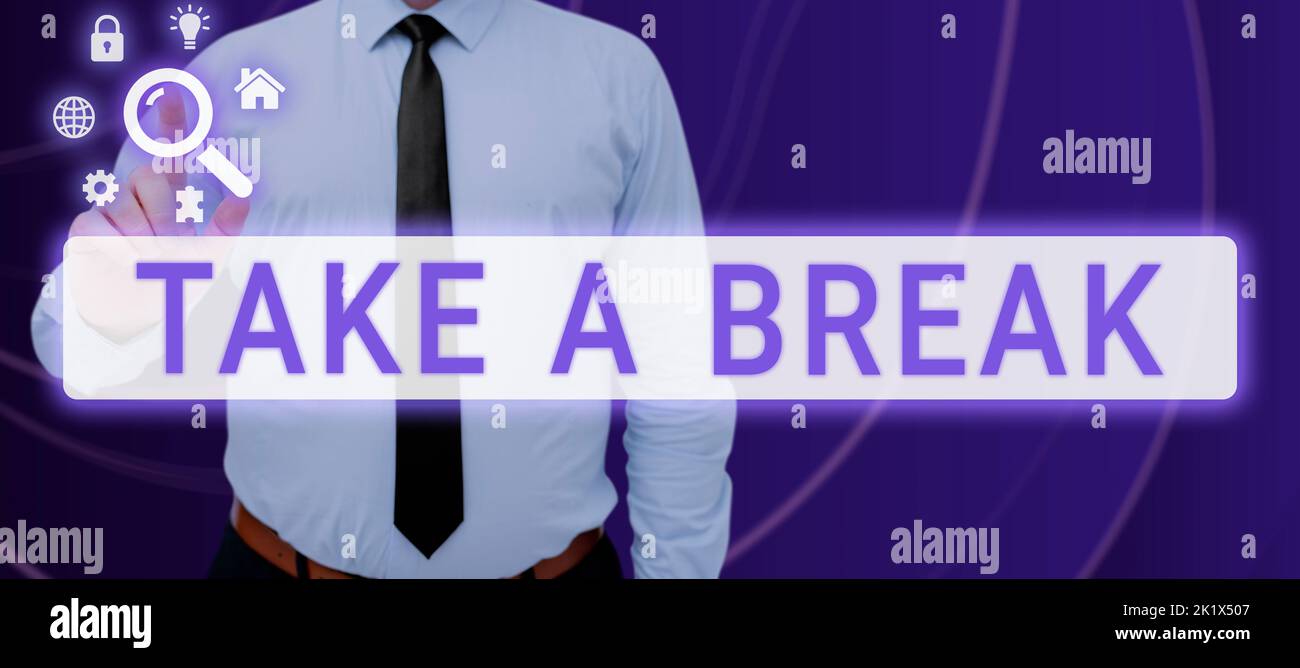 Sign displaying Take A Break. Word Written on Resting Stop doing ...