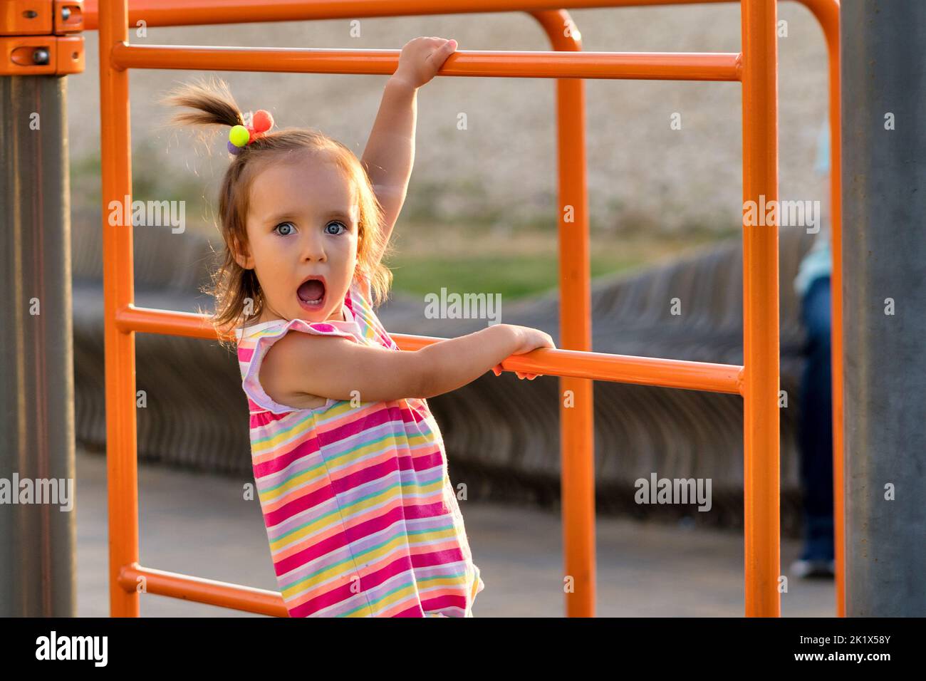 Portrait surprised, excited, screaming, emotional little girl in summer ...