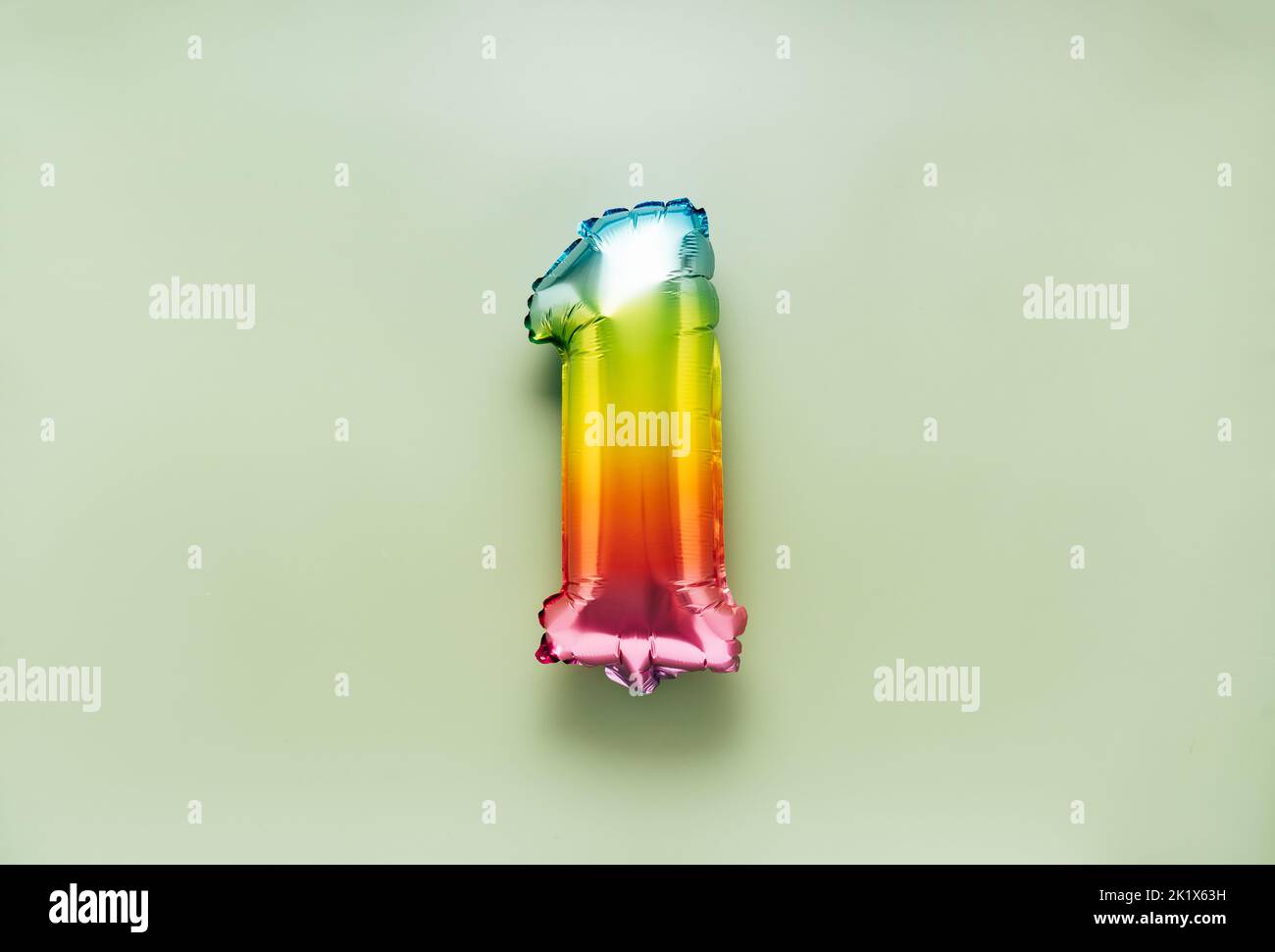 Colorful balloon number 1 on light green background. New Year of ...