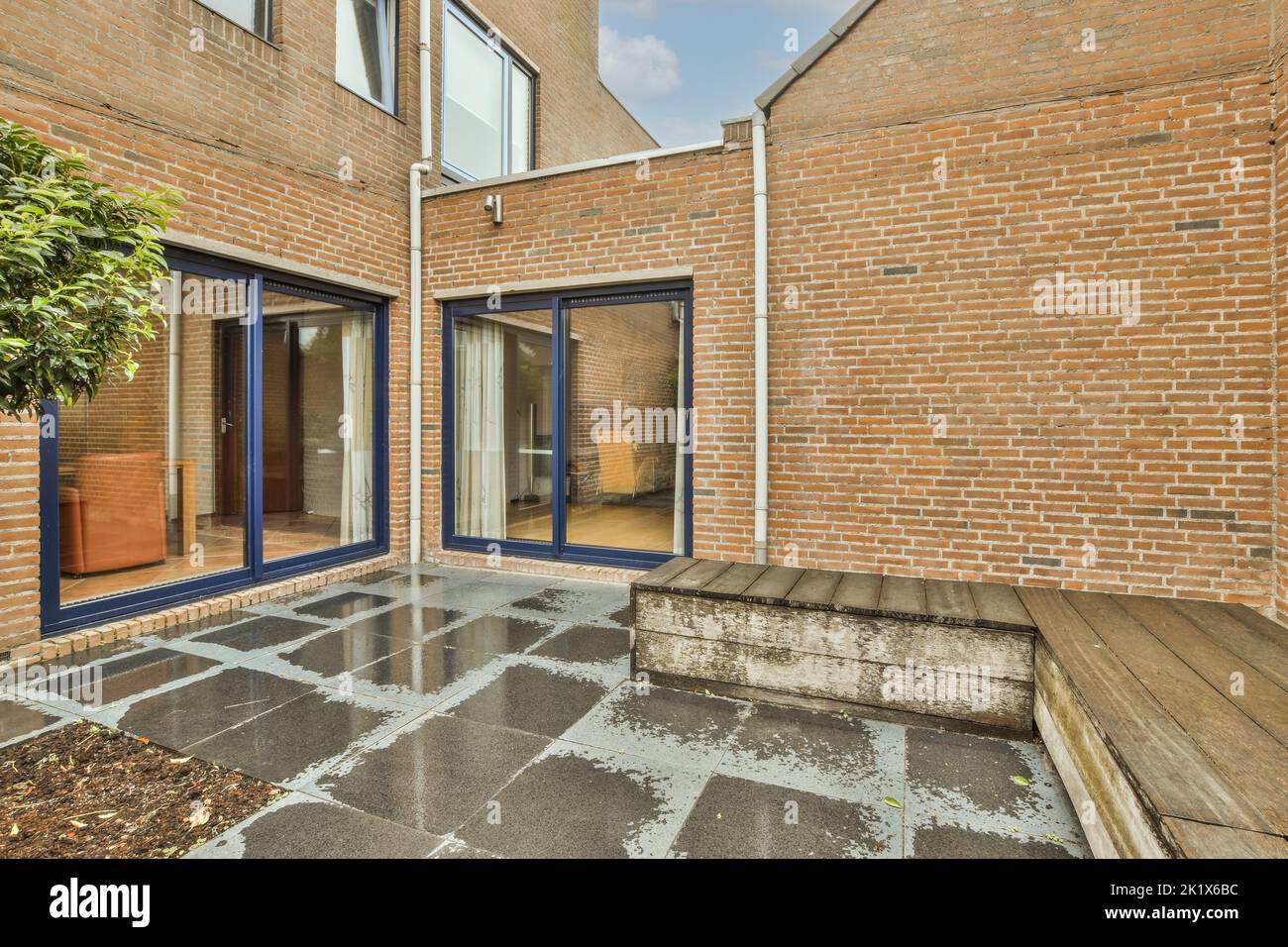 Simple patio with small garden Stock Photo - Alamy