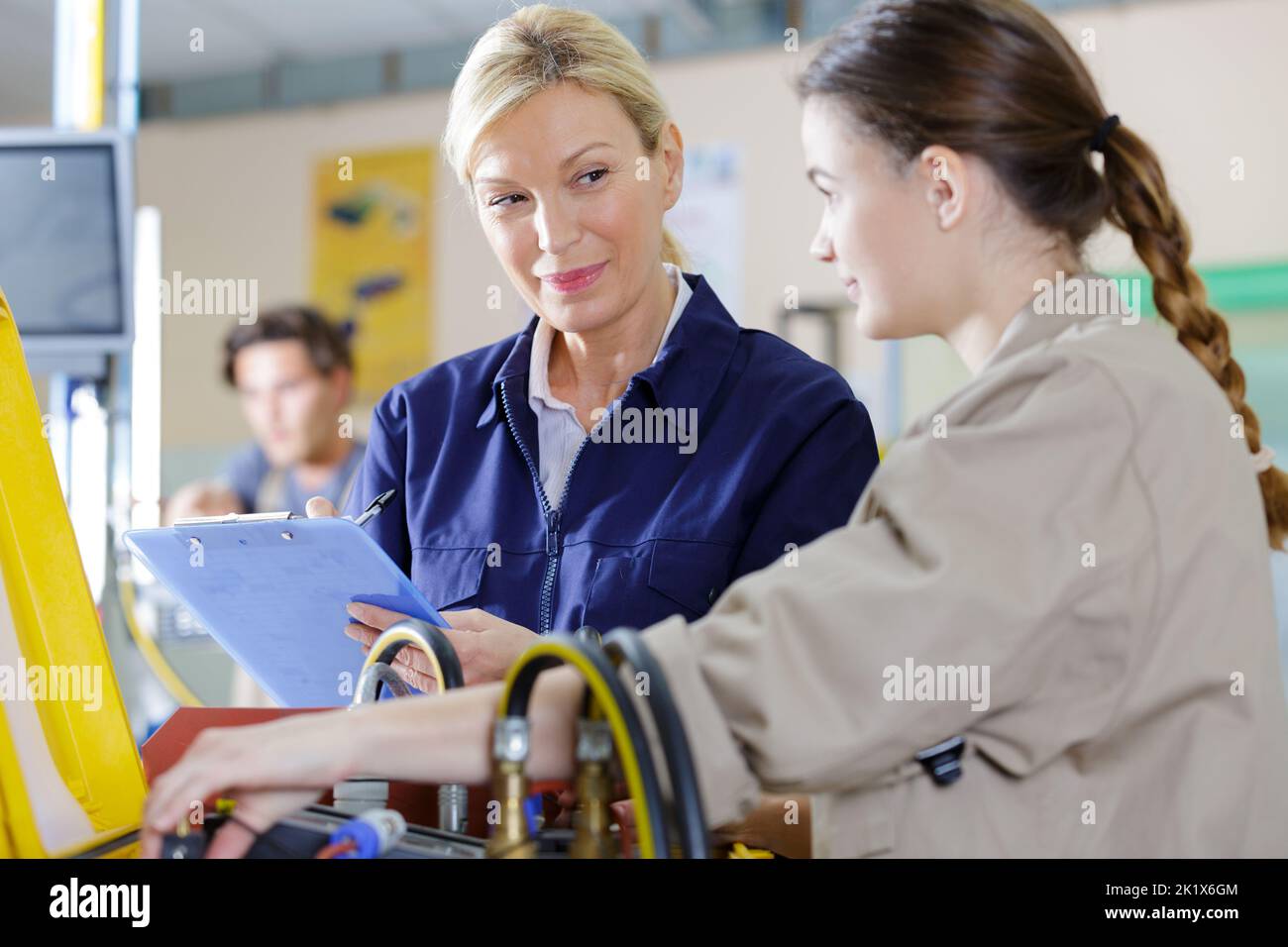 portrait of female battery assemblers Stock Photo - Alamy