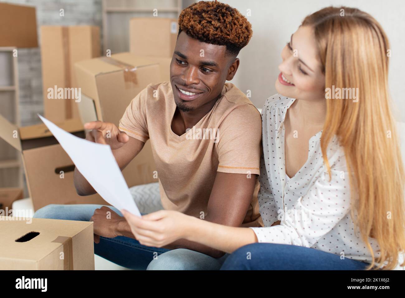 Man surrounded by boxes paperwork hi-res stock photography and images ...