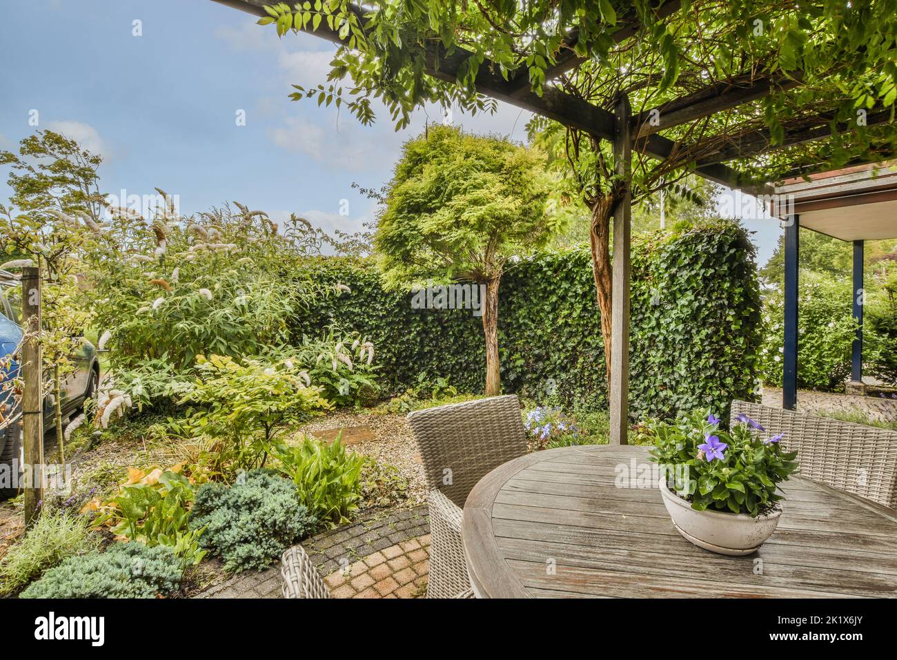 Simple small patio with small garden Stock Photo - Alamy