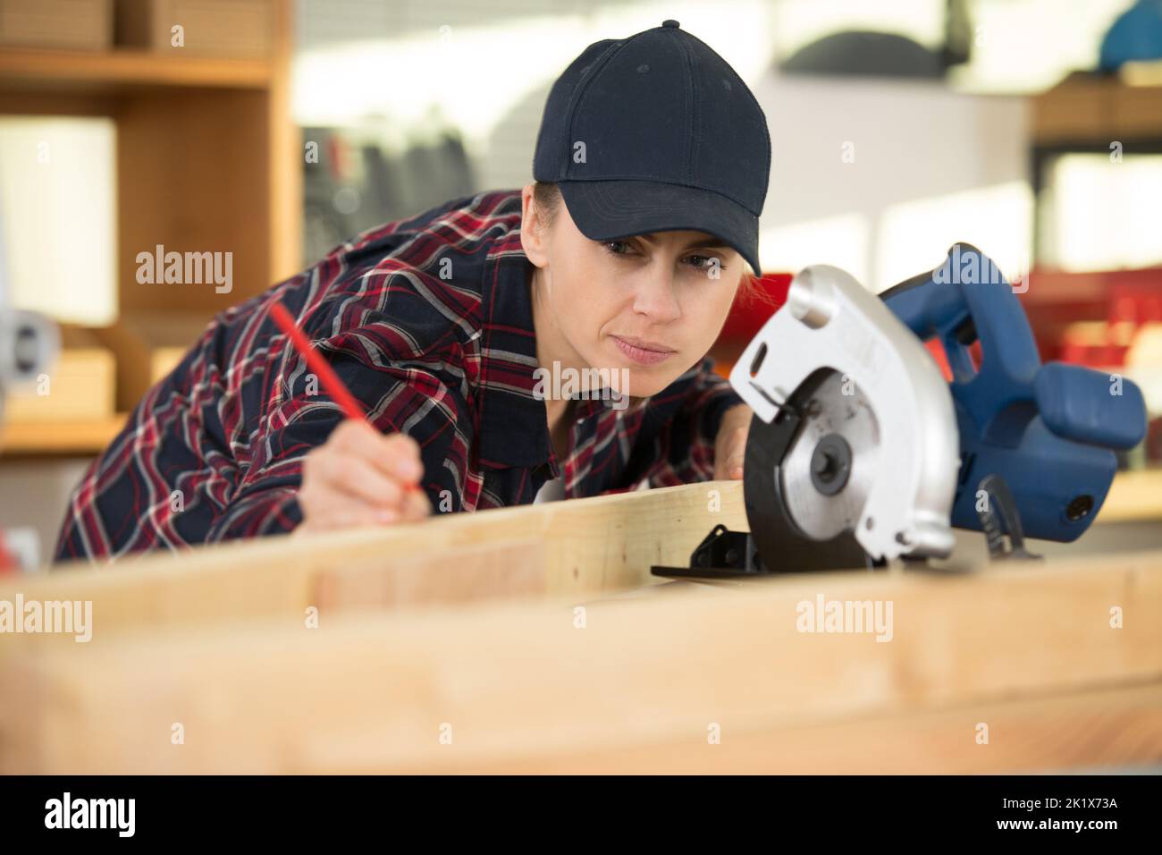 woman works in a carpentry workshop Stock Photo - Alamy