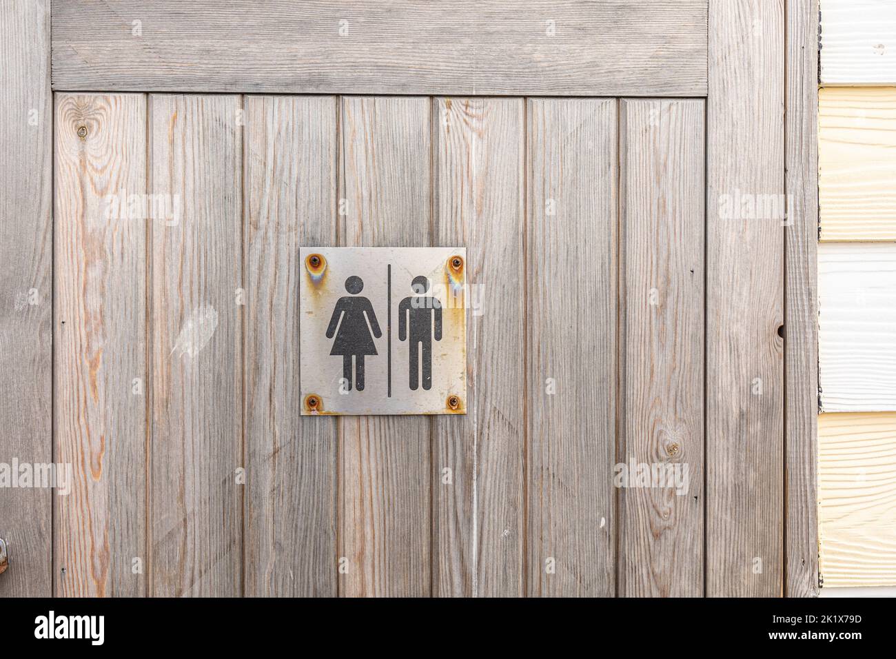 male and female symbol on a rustic wooden background Stock Photo - Alamy