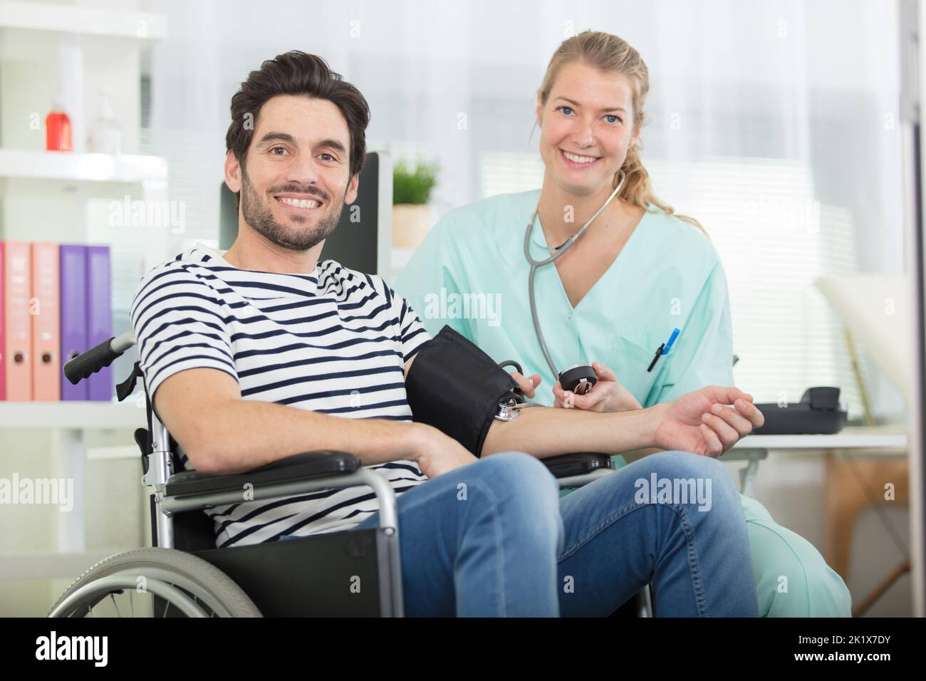 conversation between young attractive nurse and male patient Stock ...