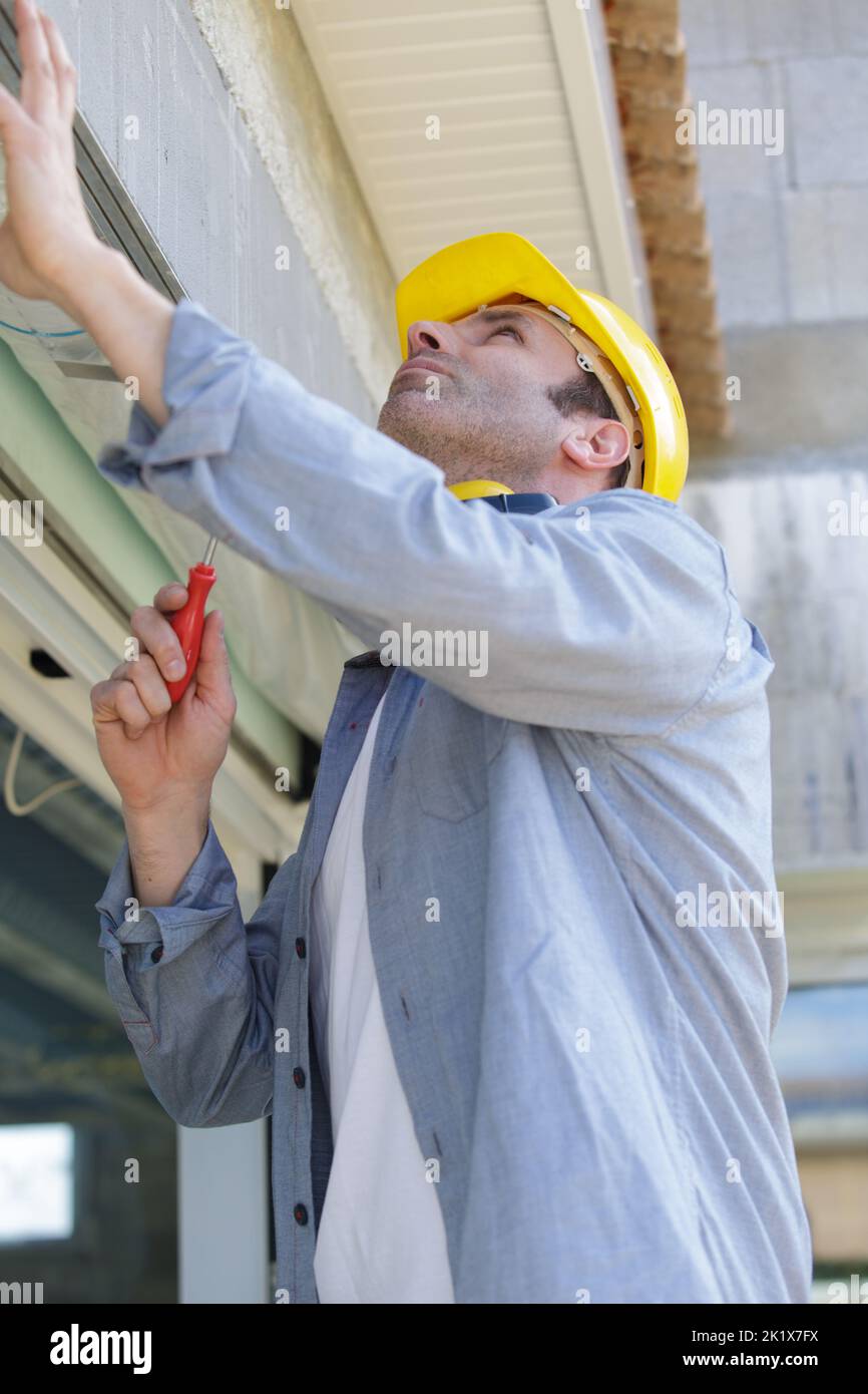 a worker is connecting pipes Stock Photo - Alamy