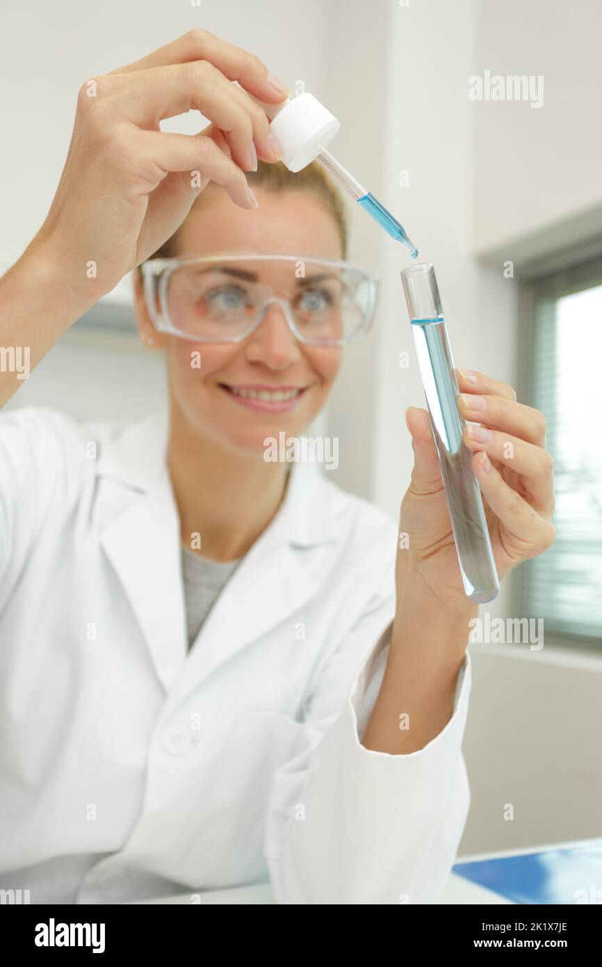 woman scientist a with pipette in lab Stock Photo - Alamy