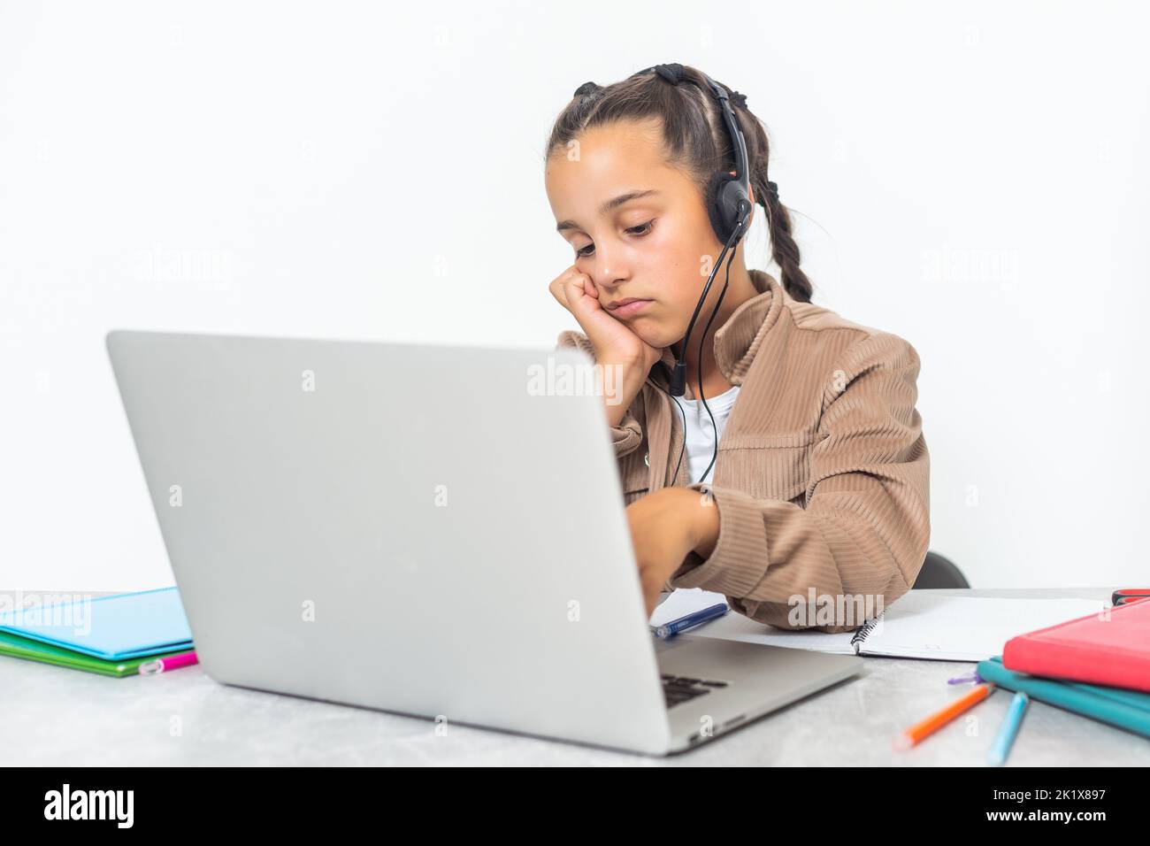 Distance learning online education. Photo of little upset and boring ...