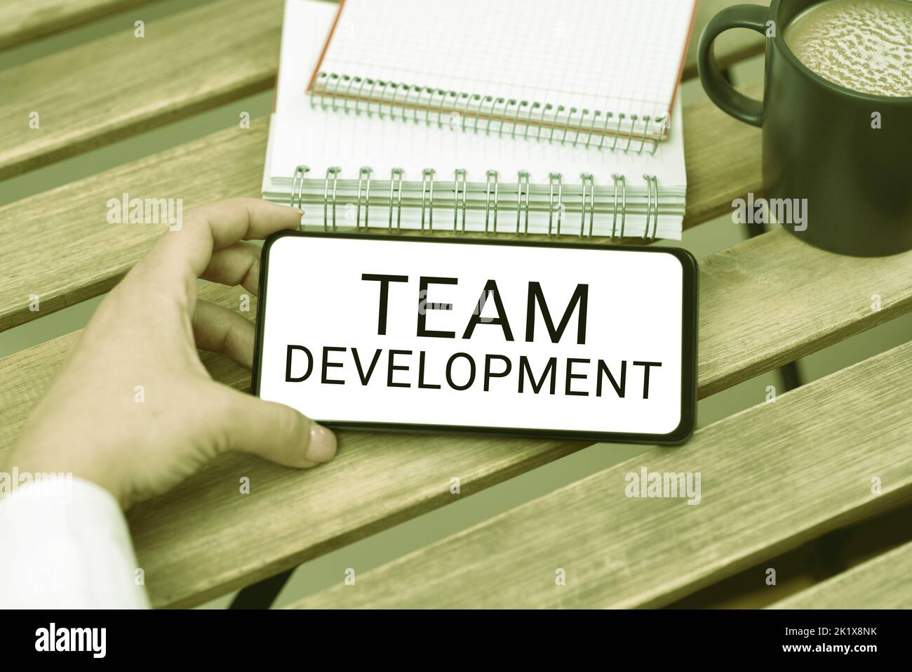 Hand writing sign Team Developmentlearn why and how small groups change ...