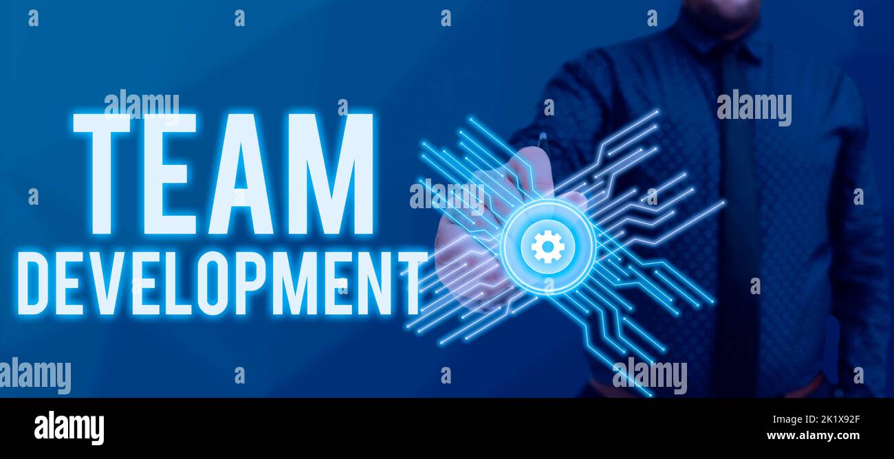 Hand writing sign Team Developmentlearn why and how small groups change ...