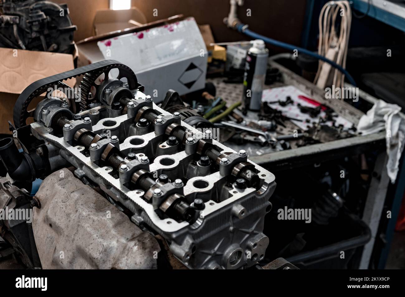 Disassembled car engine block at car service station Stock Photo - Alamy