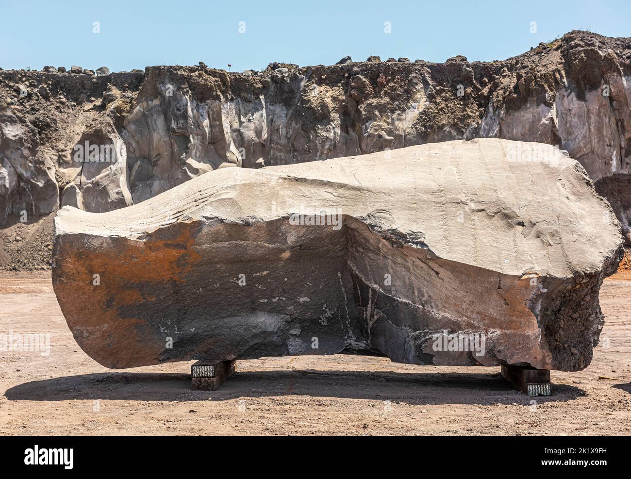 A huge slab of volcanic basalt rock extracted from a quarry in an old ...