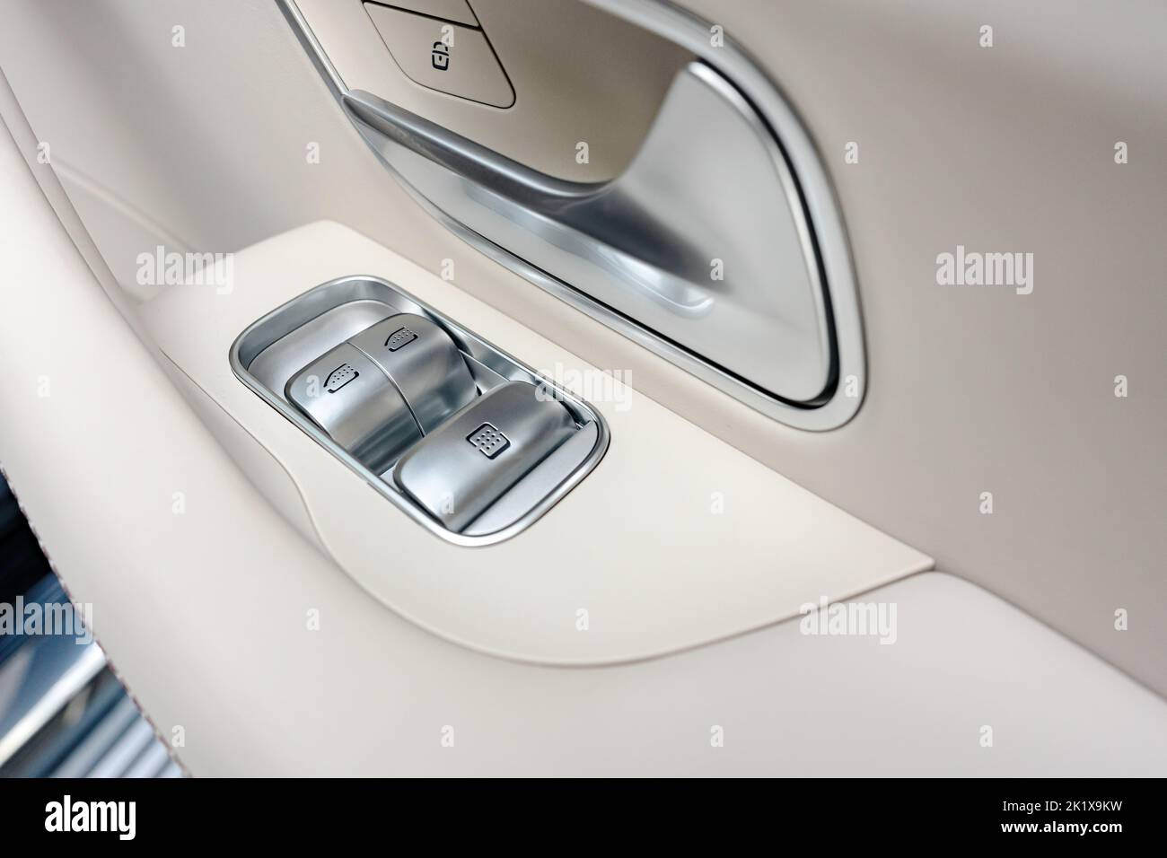 Front handle door panel with buttons of a luxury car Stock Photo - Alamy