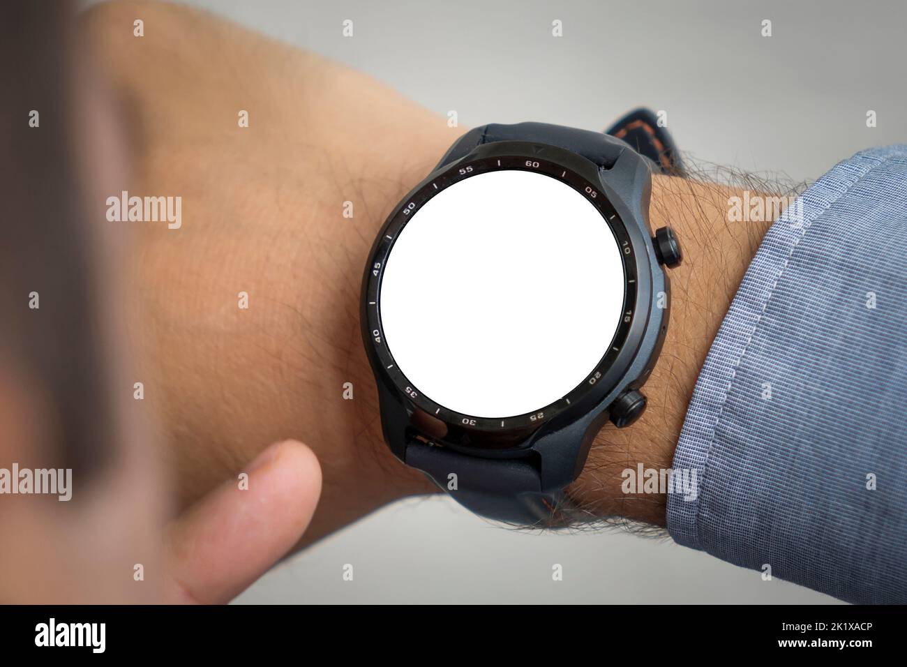Smartwatch blank screen mock up wear on the hand.. Steel metallic hand ...