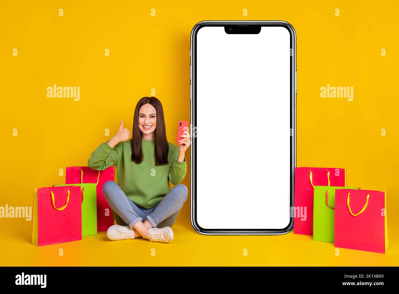 Portrait of attractive cheery woman using gadget copy space showing ...