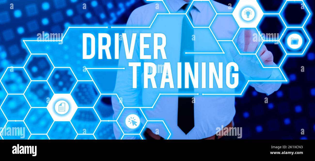 Hand writing sign Driver Trainingprepares a new driver to obtain a ...
