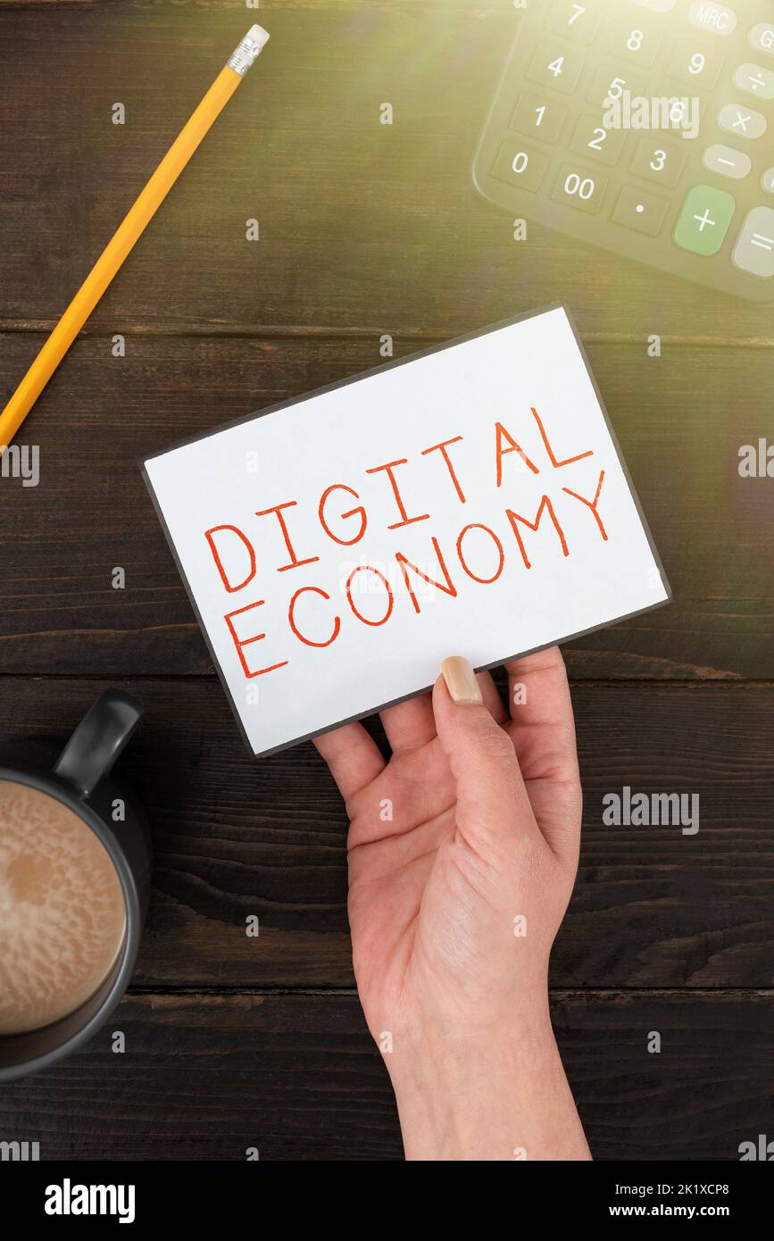 Sign displaying Digital Economyworldwide network of economic activities ...