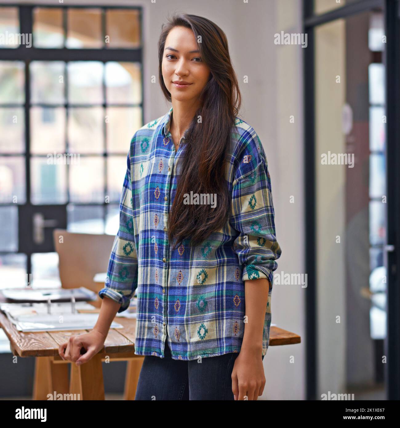 Her designs are as cool as she is. Portrait of a young female designer ...