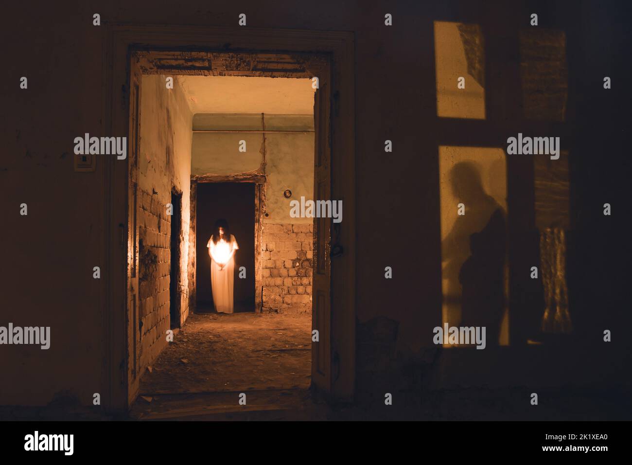 Ghost in abandoned, haunted house at night. Horror scene of scary ...