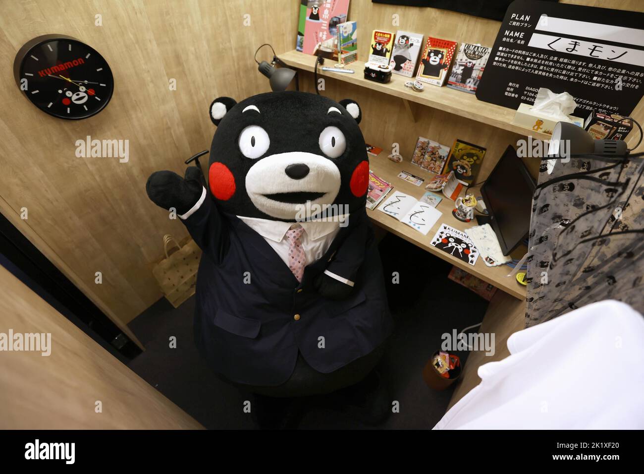Kumamon, the official black bear mascot of Kumamoto Prefecture, poses in an office that opened ...