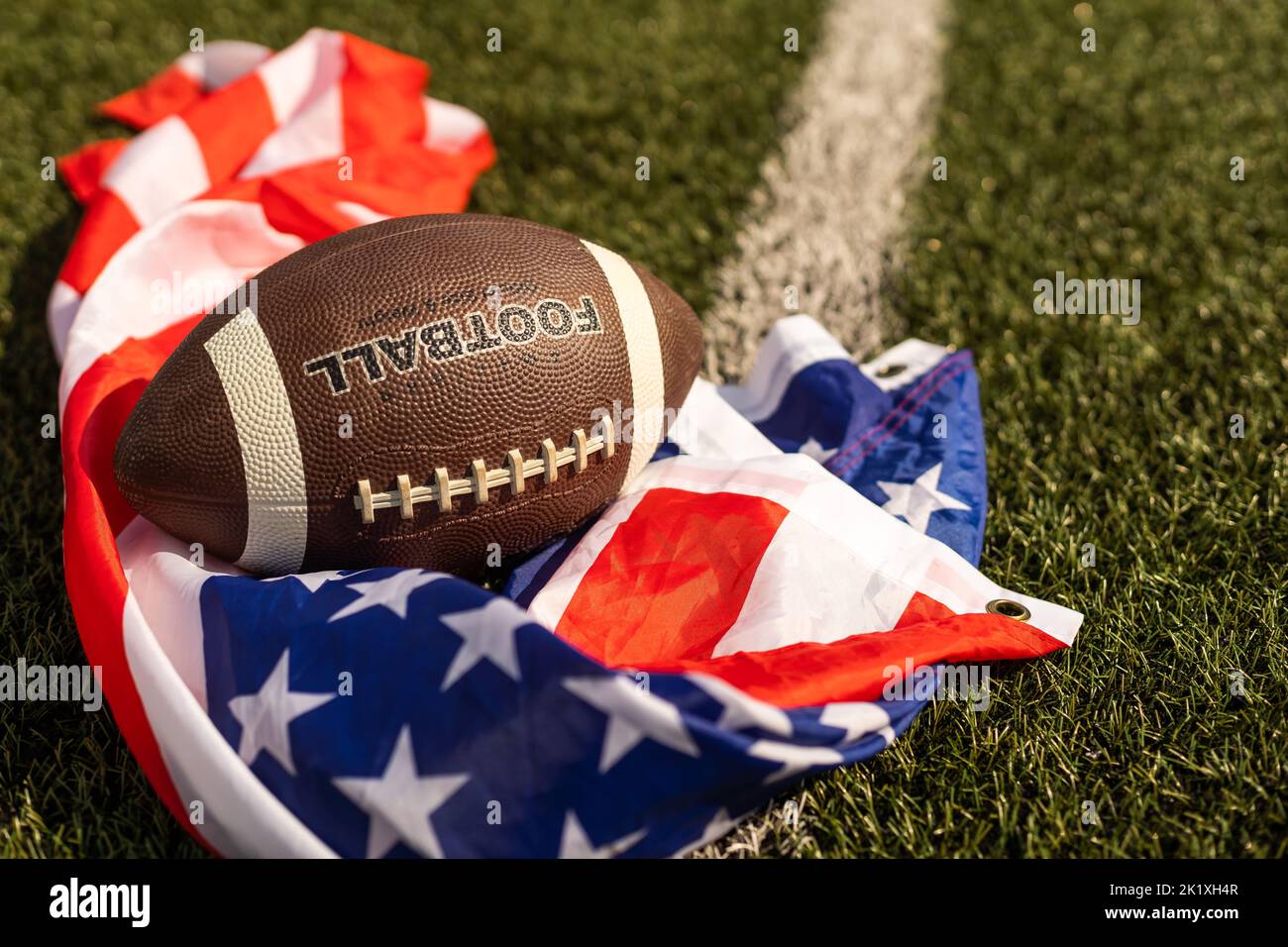 american football ball and flag Stock Photo - Alamy