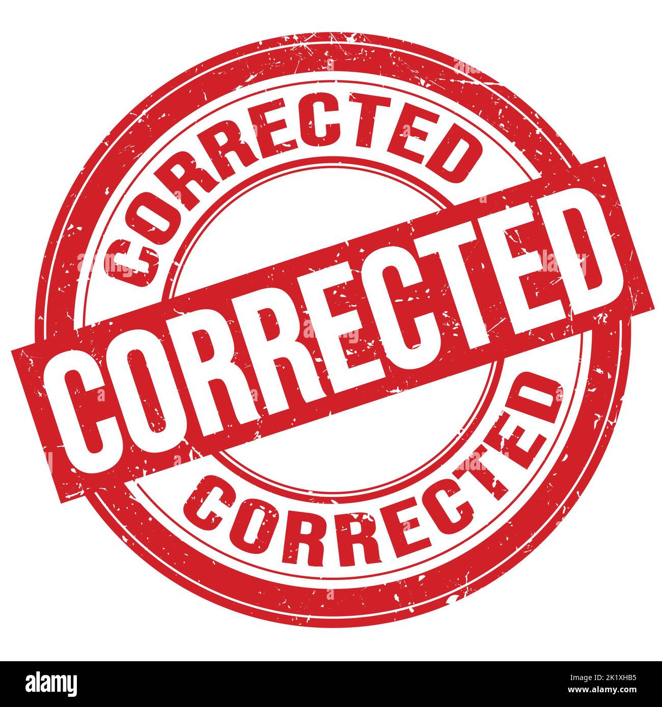 CORRECTED text written on red round grungy stamp sign Stock Photo - Alamy