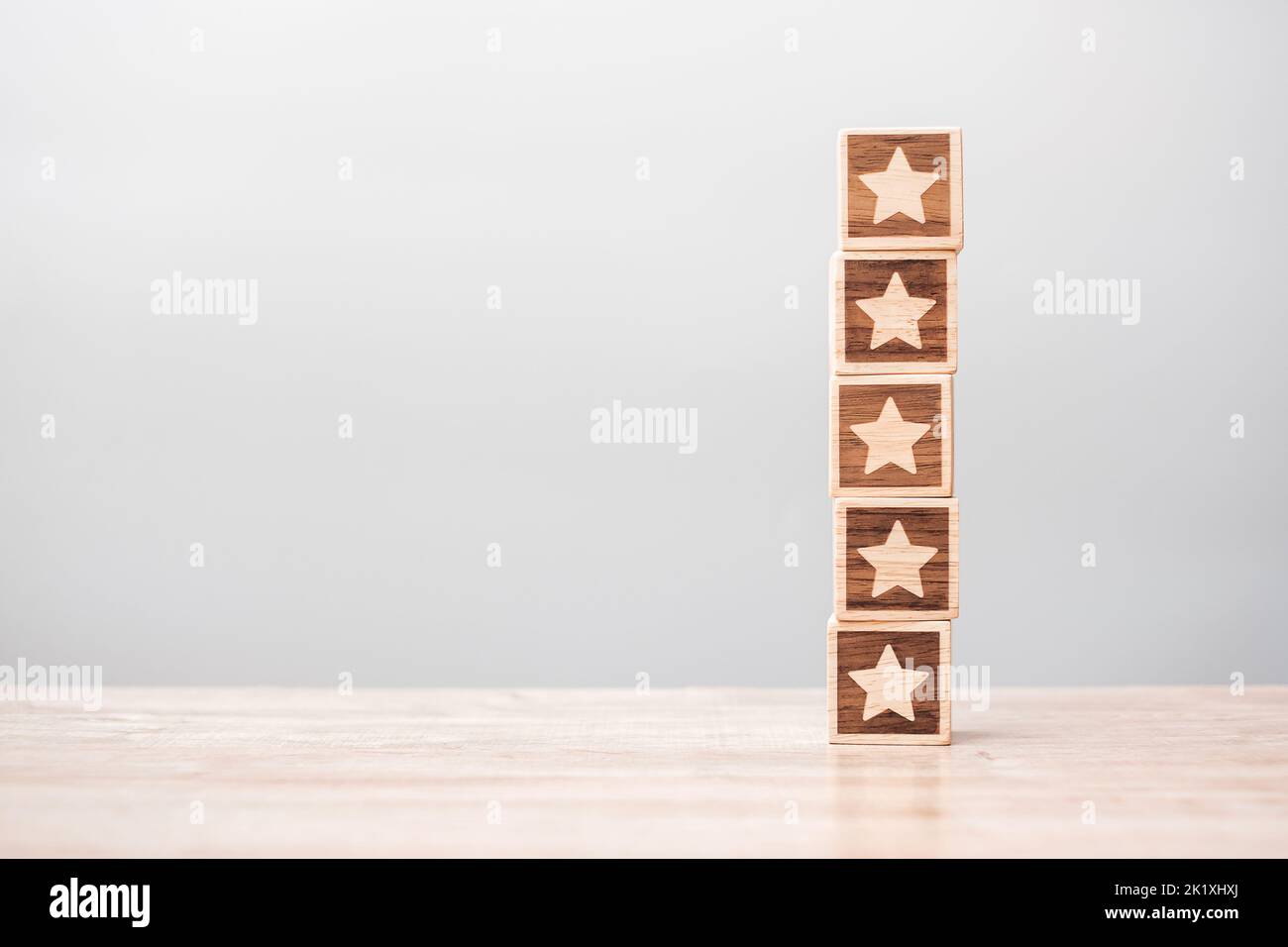 star symbol block on table background. Service rating, ranking ...