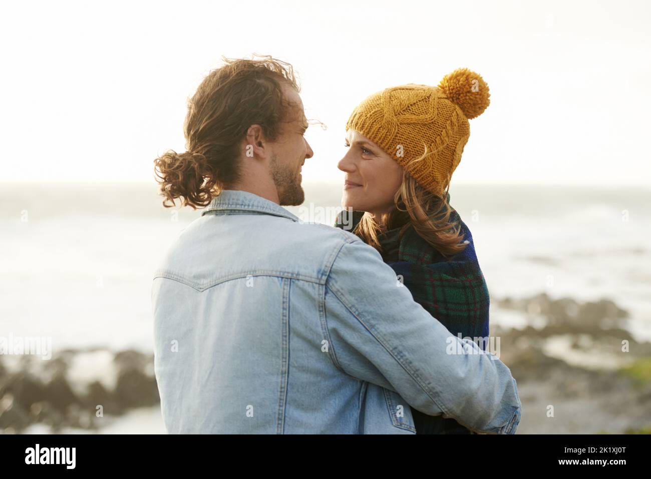 Embracing in the fresh air. an affectionate young couple sharing a warm embrace Stock Photo - Alamy