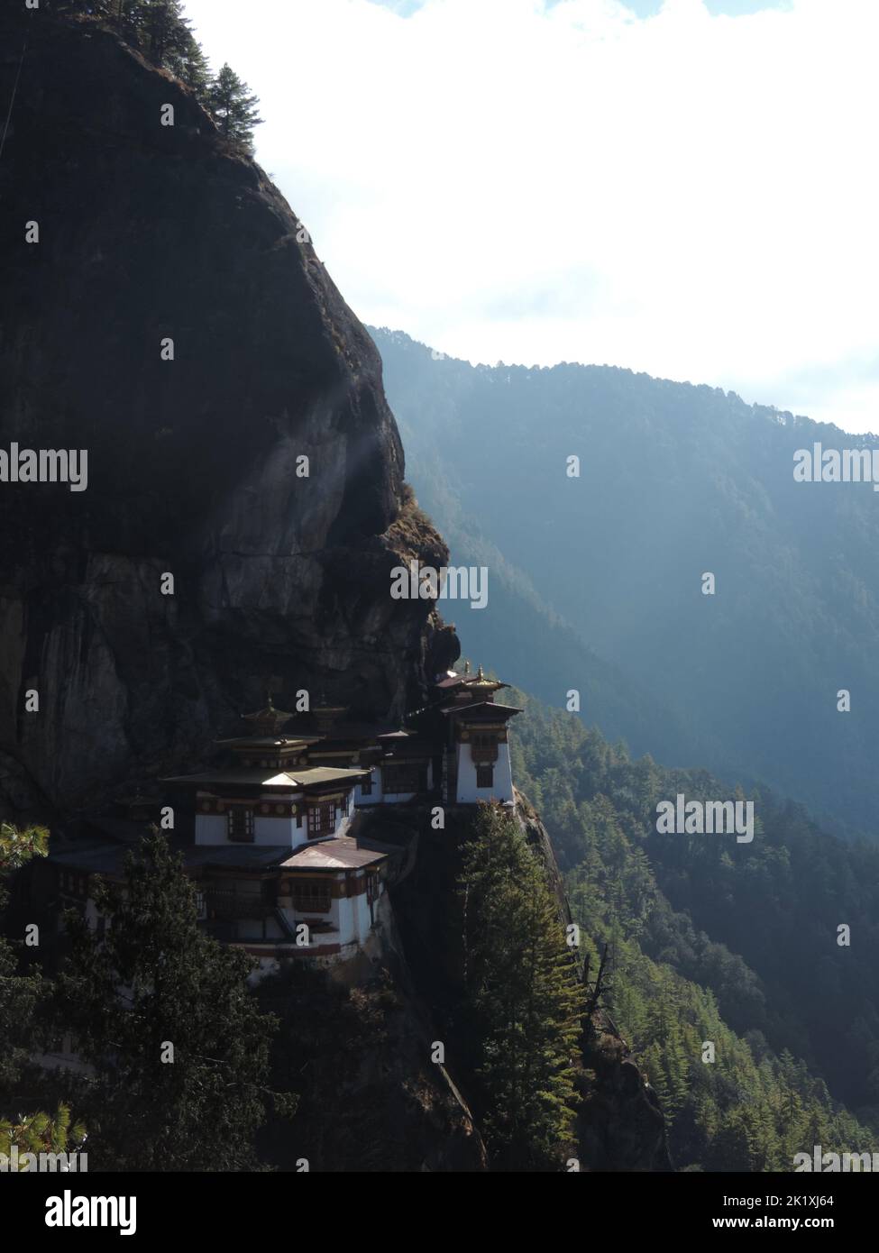 A vertical shot of the cliffside Vajrayana Himalayan Buddhist site Paro ...