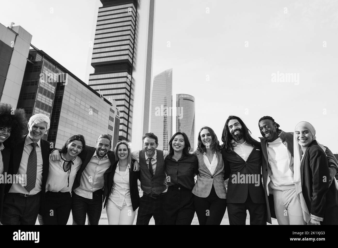 Young businessman celebrating success work Black and White Stock Photos ...