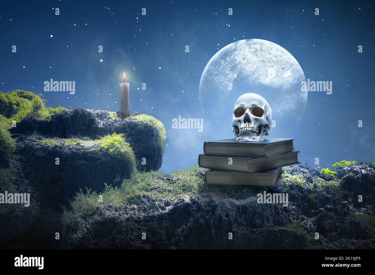 Pile of the book with a human head skull and candlelight with the night ...